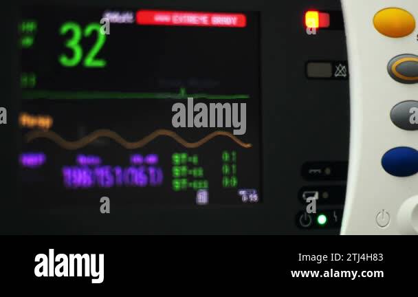 close-up ekg heart monitor flatline hospital machine ecg black and ...