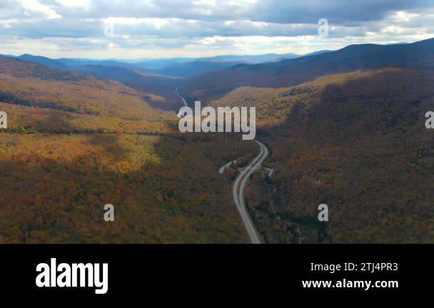 Franconia Notch with fall foliage aerial view including Profile Lake ...