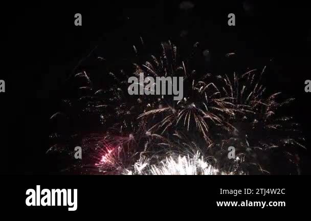 4K. loop seamless of real fireworks background. abstract blur of real ...