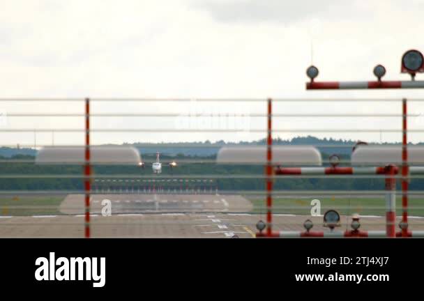 Front view of a turboprop passenger airplane descending for landing ...