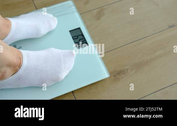 Elderly feet scales Stock Videos & Footage - HD and 4K Video Clips - Alamy