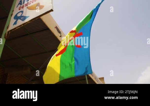 berber flag hoisted in a store in southern Morocco. Berber, self-name ...