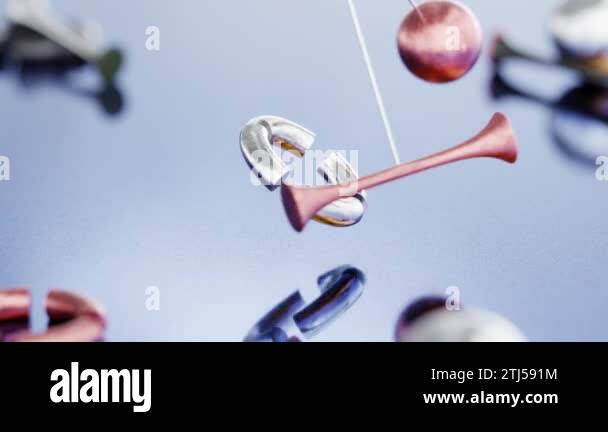 Infinite loop animation of copper ball and stick hanging on threads and ...