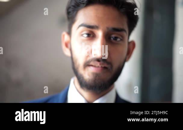 Angry exhausted CEO scolding his employee at work. A man in a suit is ...