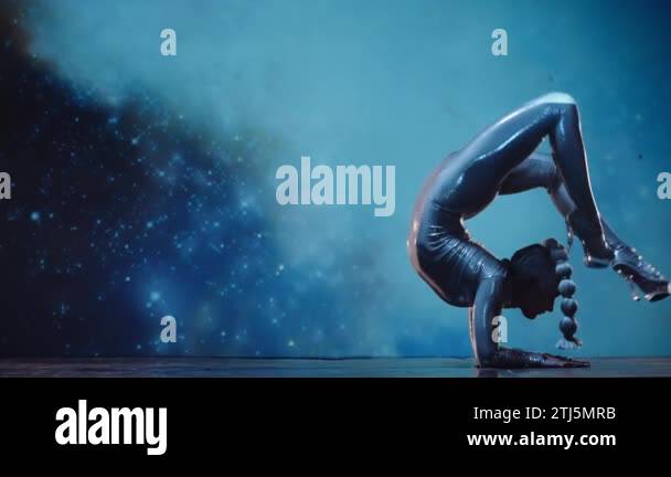 Flexible Woman Contortionist Wearing Shiny Outfit and High Heels ...