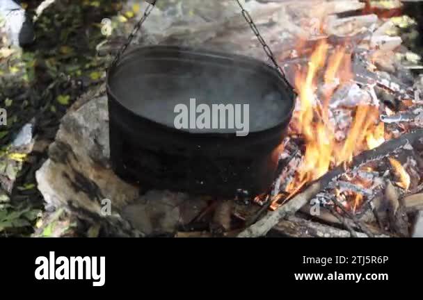 Boiling water on campfire Stock Videos & Footage - HD and 4K Video ...