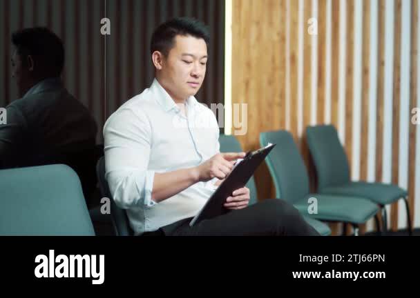 Man holding folder Stock Videos & Footage - HD and 4K Video Clips - Alamy