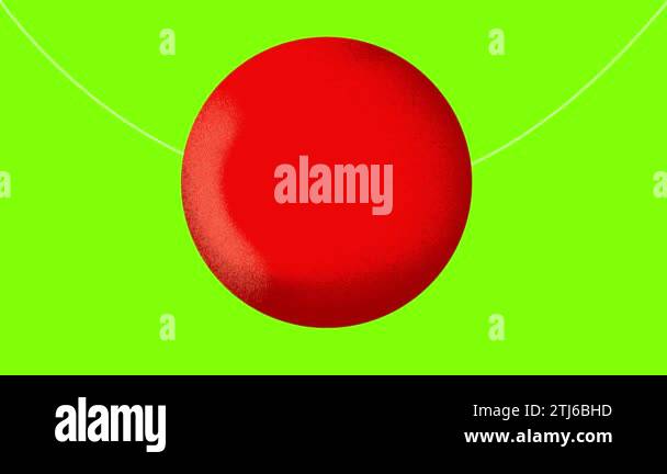 Clown nose putting on animation on a green screen. The concept of a ...