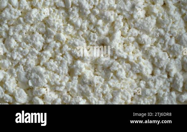 Cottage cheese of background, top view, rotates. White grainy texture ...