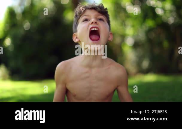 Child boy screaming from top of his lungs in slow-motion 120fps. Kid ...