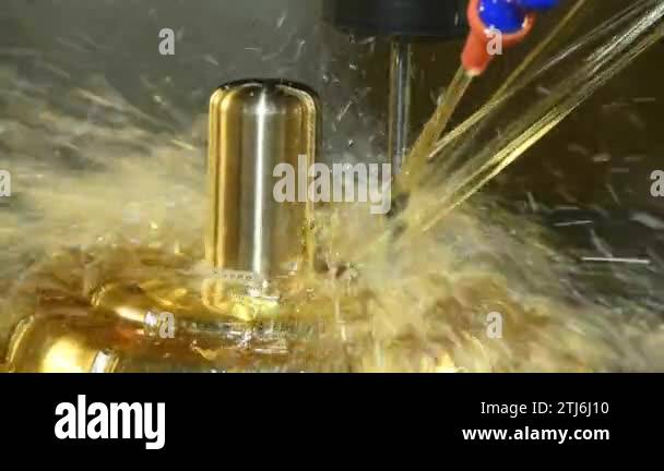 Slow motion scene the CNC milling machine cutting the shell mold parts ...