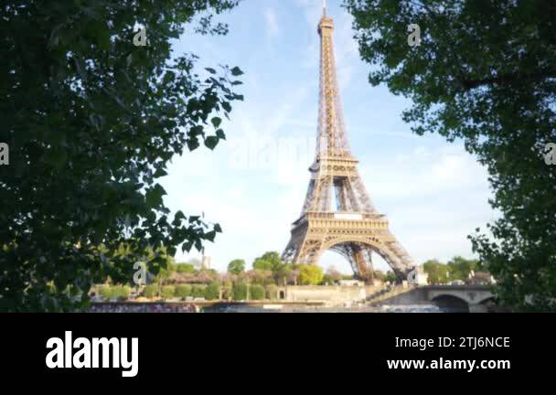 Full view of the Eiffel Tower across the River Seine in Paris. Historic ...