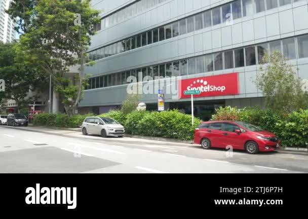 Singapore 2 June 2022 street view of SingTel company logo Stock Video ...