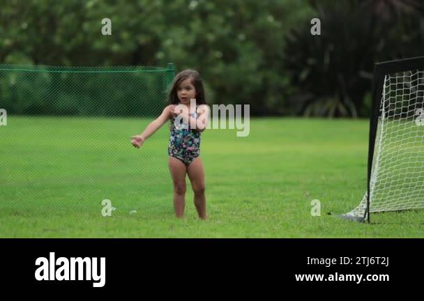Little girl child checking armpit rash outside, kid looking at mosquito ...