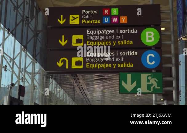 Baggage Claim and Immigration sign at international airport Stock Video ...