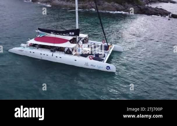 Party on a sailing catamaran, people have fun and have a good time ...