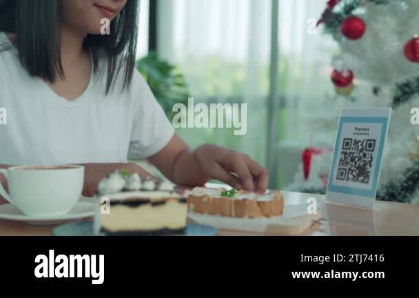 Beautiful woman scan barcodes for order. Women using their mobile ...