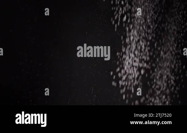 Stream Falling Particles, Sparks, Dust, Debris, Powder on Black ...