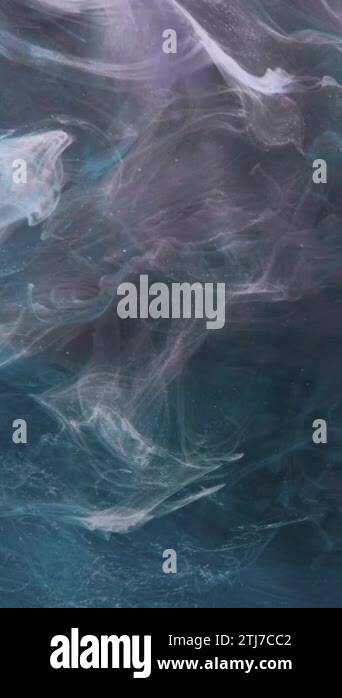 Vertical video. Mist flow. Ink water. Magic fume. Smoke spreading. Blue ...