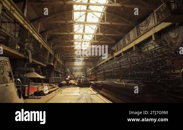 Big factory warehouse hangar with metal structures. Warehouse ...