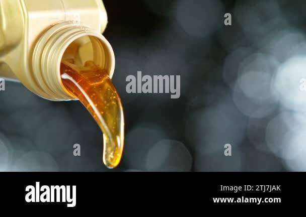 Super Slow Motion Shot of Pouring Oil from Plastic Container at 1000 ...