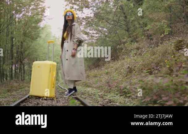 Lost in nature, a young woman is lost in the forest, but with every ...