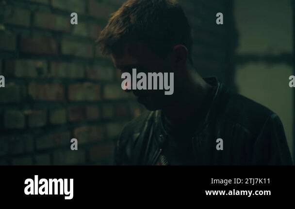 Mafia member or criminal in leather jacket after the murder touching ...