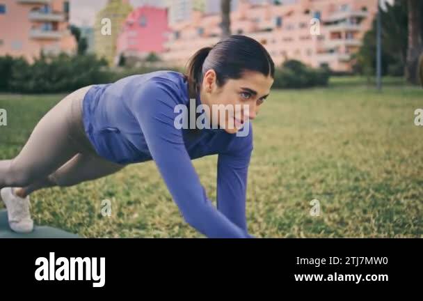 Happy woman sport exercising at open air place. Smiling athlete girl ...