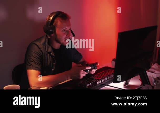 Game fail. Cyber competition. Unhappy male gamer playing computer ...