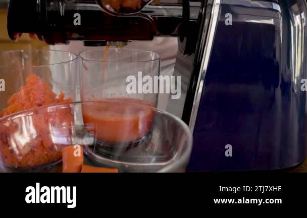 Slowly dripping of fruit juice and separating the pulp Stock Video ...