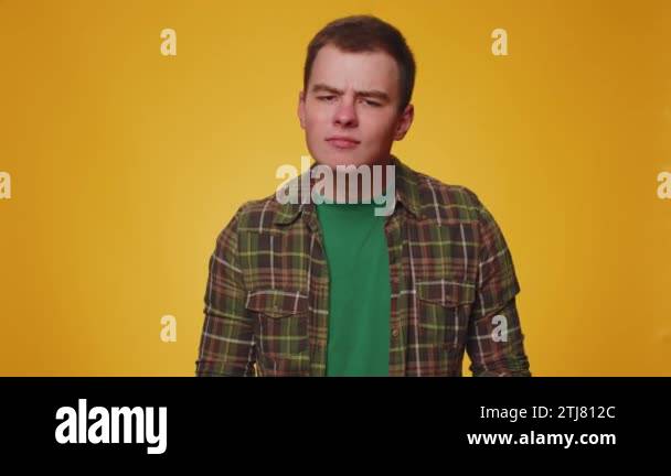 Displeased man shakes finger and saying no, be careful, scolding and ...