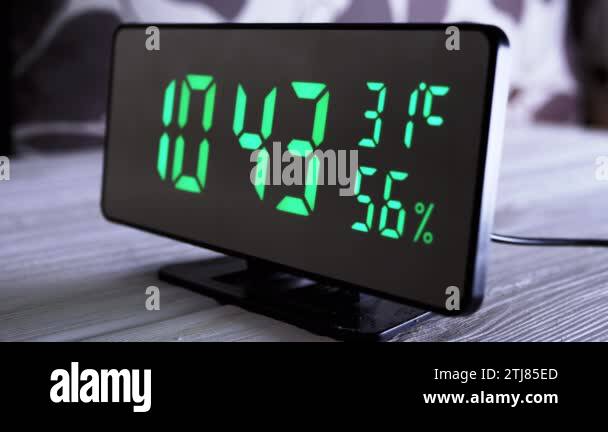 Digital Clock Showing Time on Green Display 10:43 AM, Temperature, Air ...