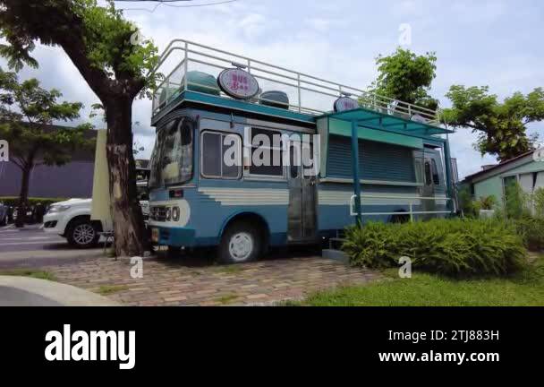An old bus converted into a double-decker bar, bar bus Stock Video ...