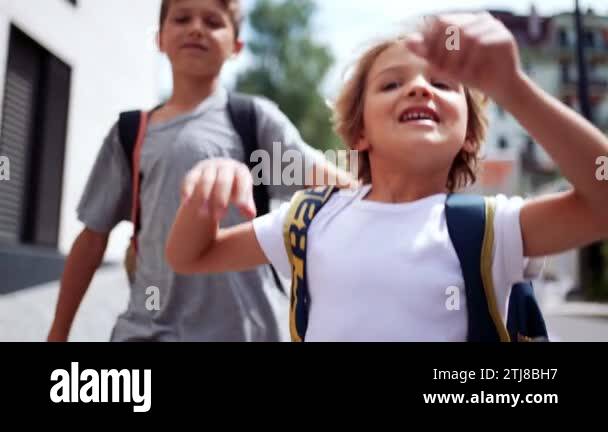 Two kids going to school Stock Videos & Footage - HD and 4K Video Clips ...