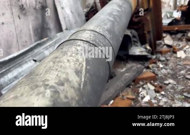 rusty and broken Russian tank with turret torn off by an explosion, hid ...