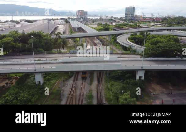 Butterworth, Penang, Malaysia - Jun 24 2022: Aerial view KTM train move ...