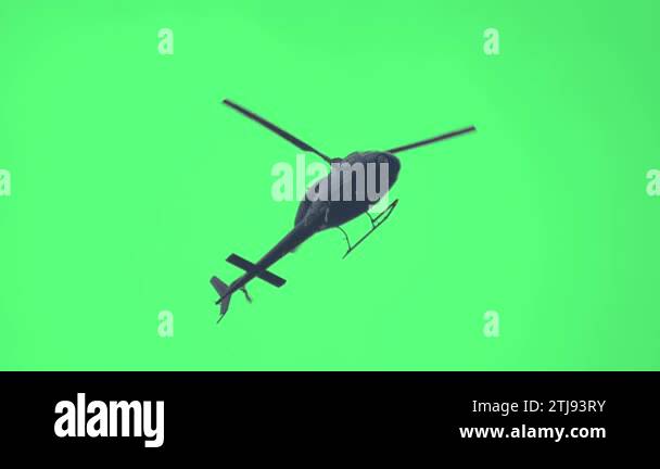 Helicopter flying on green screen low angle camera. Realistic ...