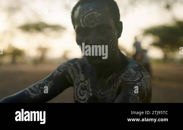 A Portrait Of A Karo Tribe Man With Traditional Body Painting In Omo ...