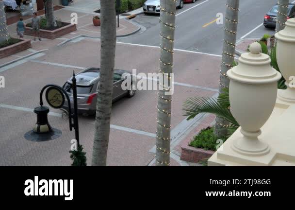 Naples, Florida. High angle video of pedestrians crossing street with ...