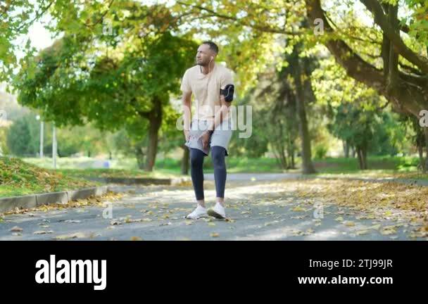 young runner athlete with muscle pain. Man massaging Stretching, trauma ...