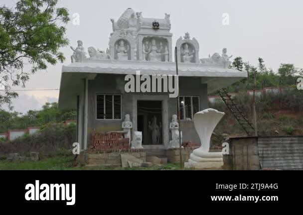 A view of the new Hindu temple being built in the jungle environment ...