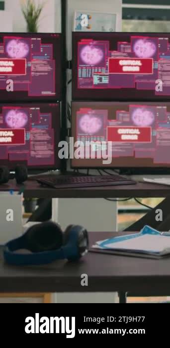Vertical video: Empty office with computer monitors displaying system error and hacking attack ...