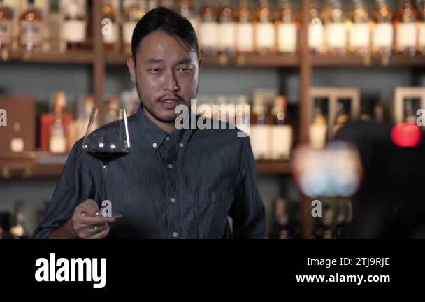 Night club concept of 4k Resolution. Bartender confidently giving an ...