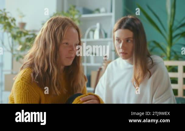 Help and Support. Red Haired Depressed Teenager Girl Talks to a Female ...