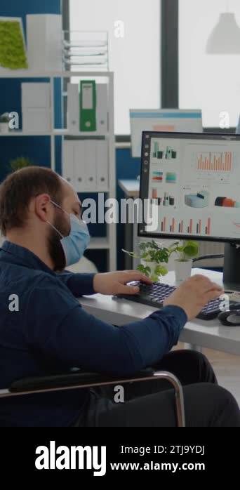 Video vertical: Diverse colleagues with masks respecting social ...