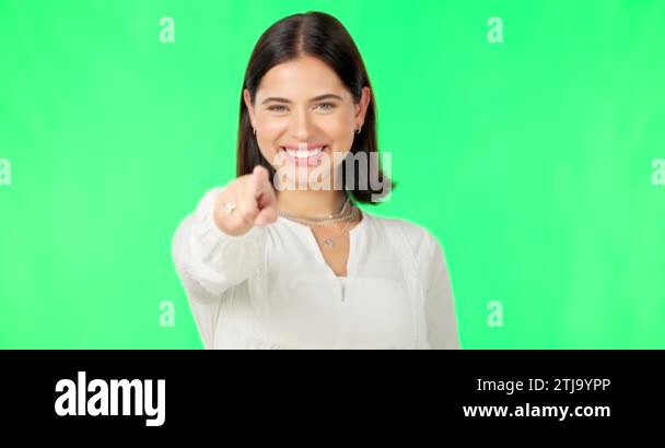 Face, pointing to you and woman with green screen, smile and success on ...