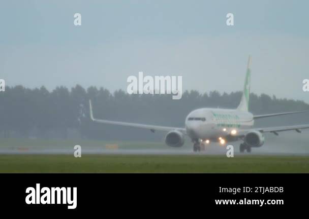 AMSTERDAM, THE NETHERLANDS - JULY 24, 2017: Aircraft takeoff, side view. Boeing 737, PH-HSA of ...