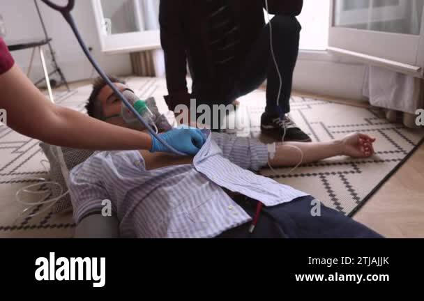 Emergency help for unconscious man, First aid preparation Emergency CPR for female doctor taking ...