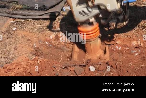Tamping machine compactor tool vibratory plate jumping at compacting to ...