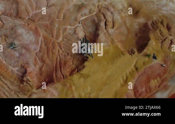 aerial landscape footage of the soil erosion due to deforestation and ...